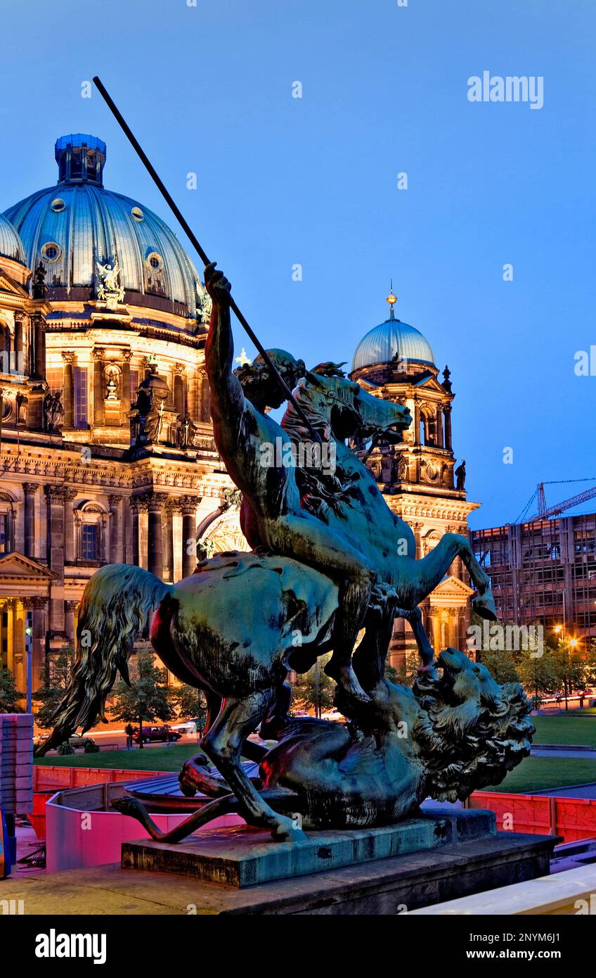 Statue of the hunter of lions by Albert Wolf and Berliner Dom.Berlin ...