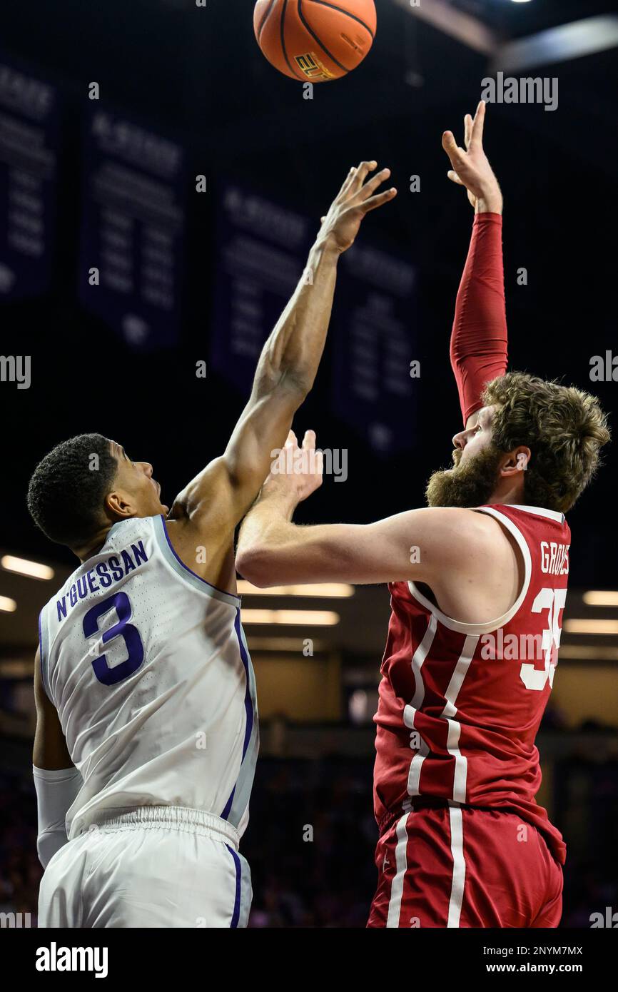 Oklahoma forward Tanner Groves (35) goes up for a shot over Kansas ...