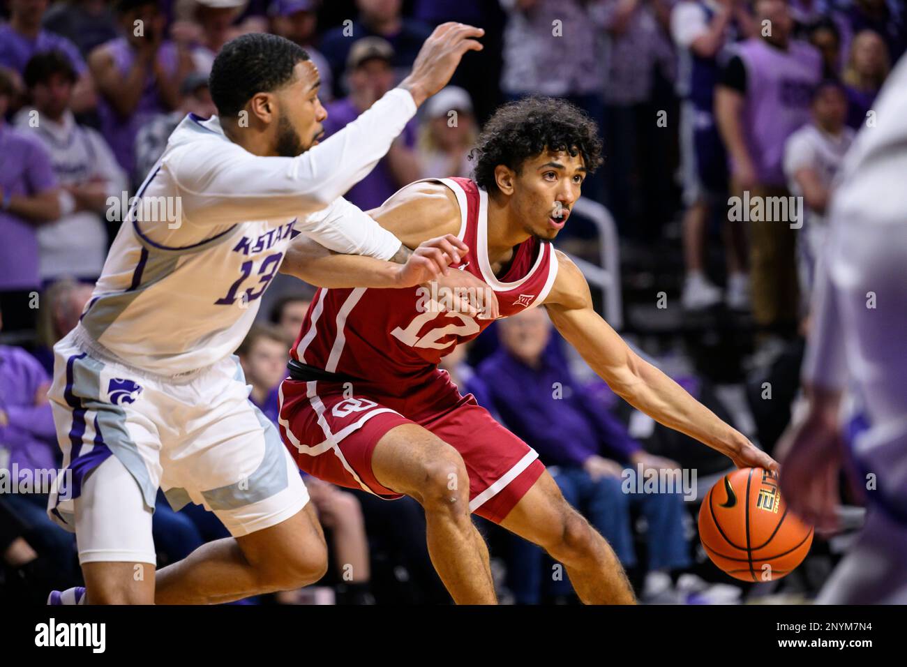 Oklahoma guard Milos Uzan (12) is pressured by Kansas State guard Desi ...
