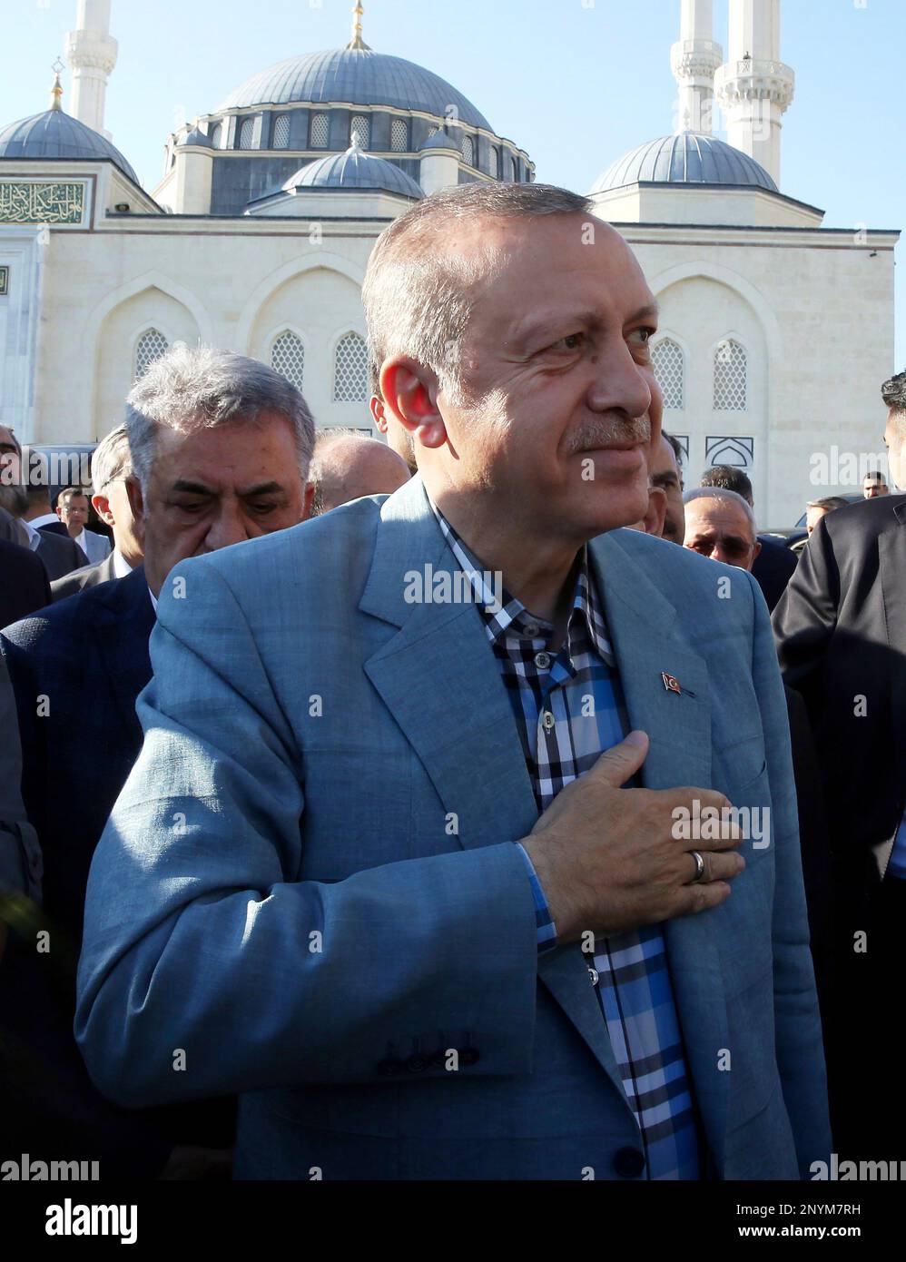 Turkey's President Recep Tayyip Erdogan smiles to his supporters after ...