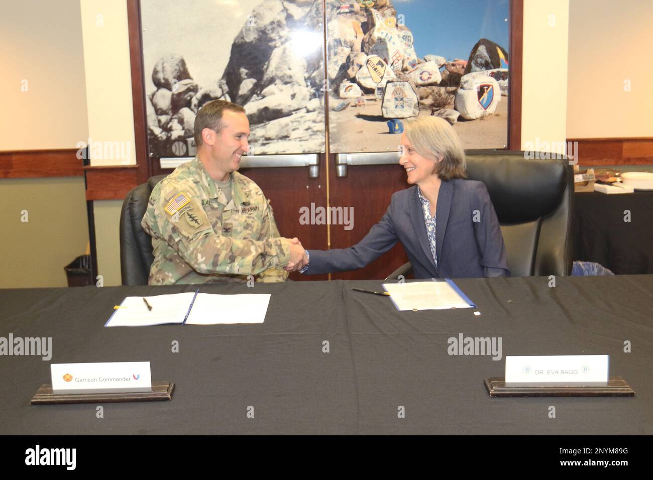 Col. Jason Clarke, Fort Irwin garrison commander, and Dr. Eva Bagg ...
