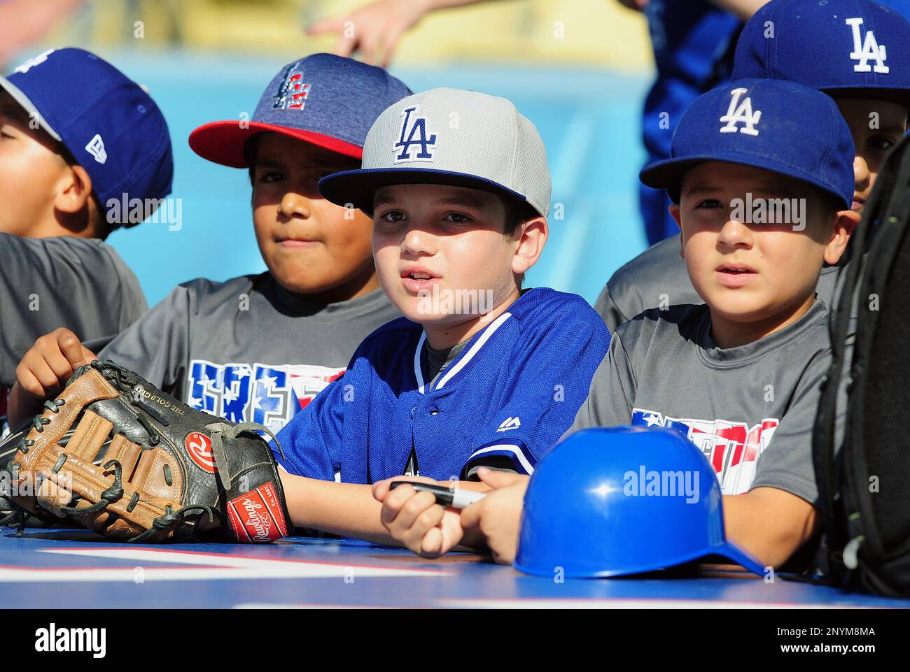 LOS ANGELES, CA - JUNE 24: Fans by the third base dugout watch the Los ...