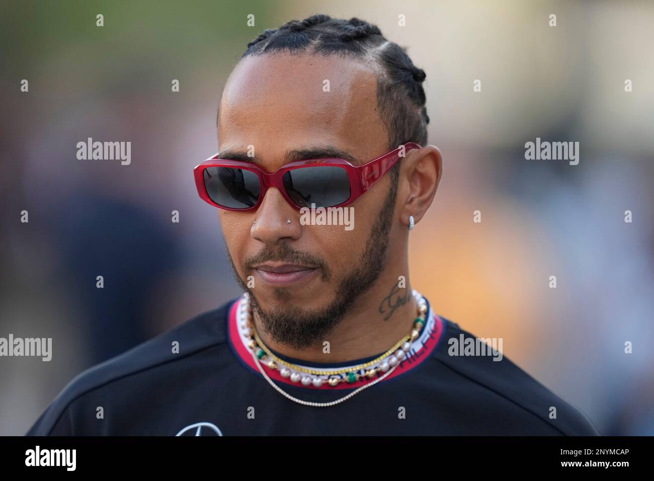 Mercedes driver Lewis Hamilton of Britain arrives for an interview at ...