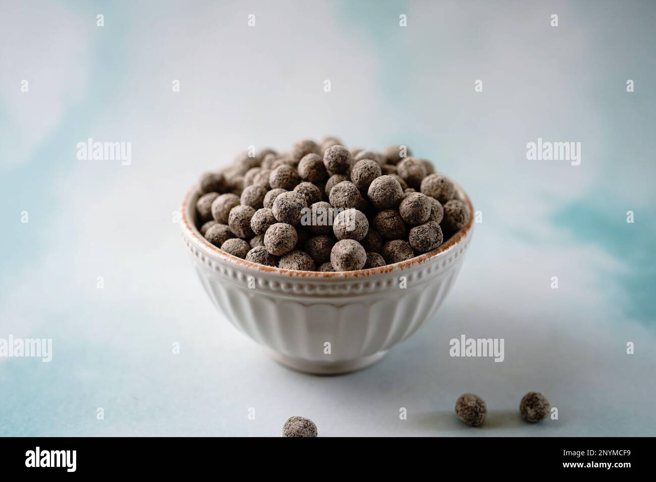 Raw black tapioca pearls - Ingredient for Boba bubble tea, selective ...