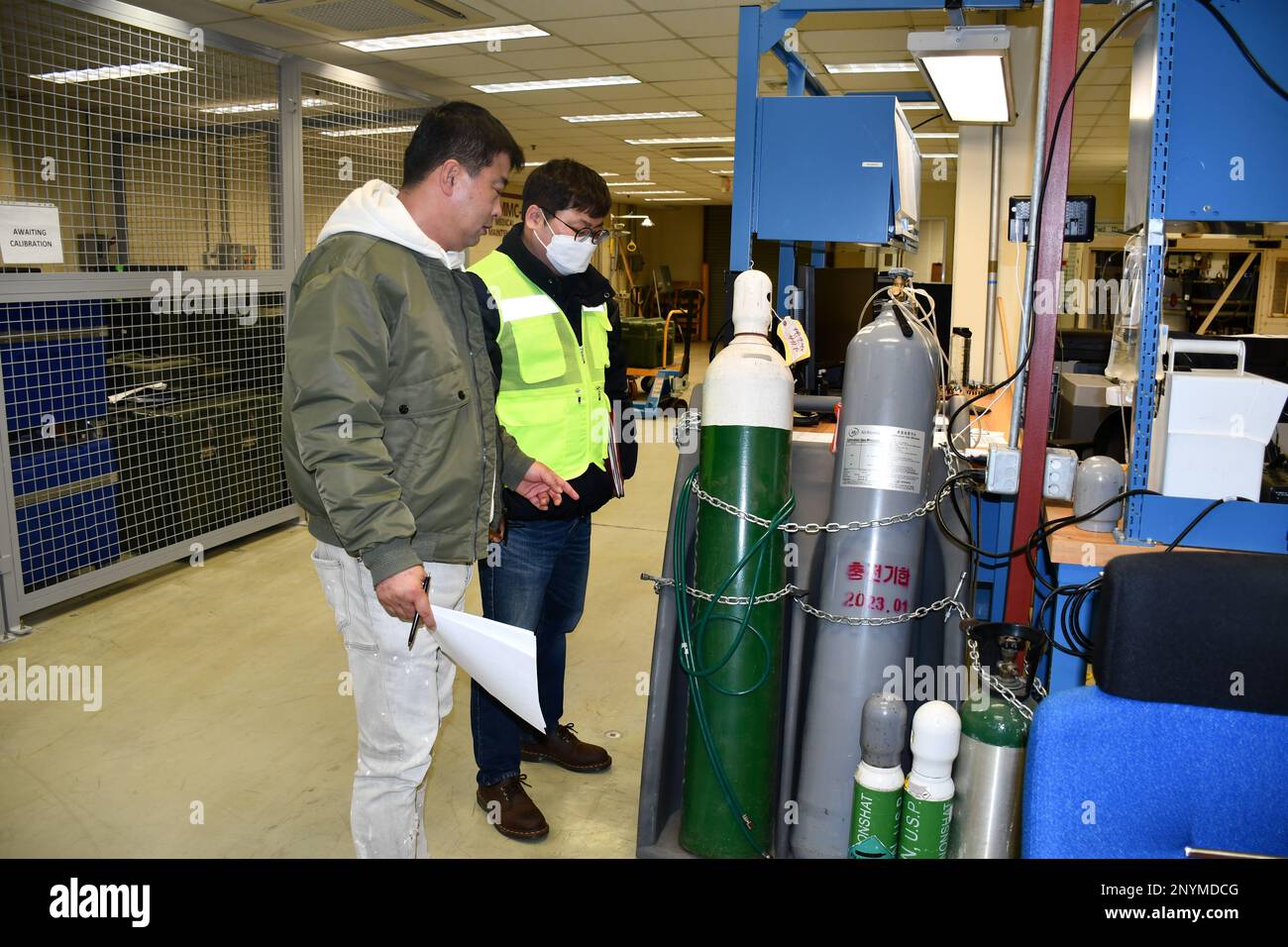 Choe, Chae-hun, right, safety and occupational health specialist for ...