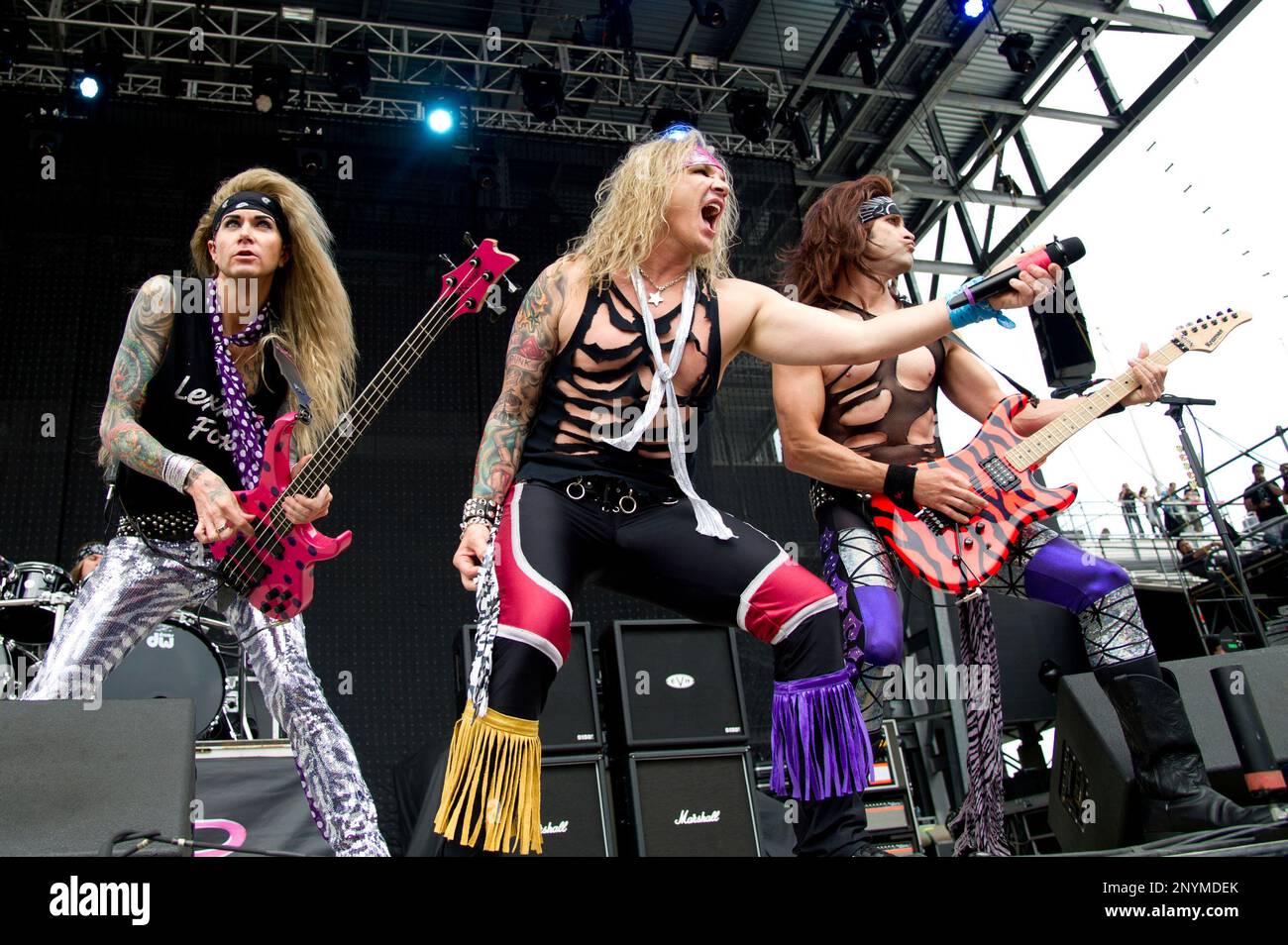 Travis Haley, Ralph Saenz, and Russ Parrish of Steel Panther perform ...