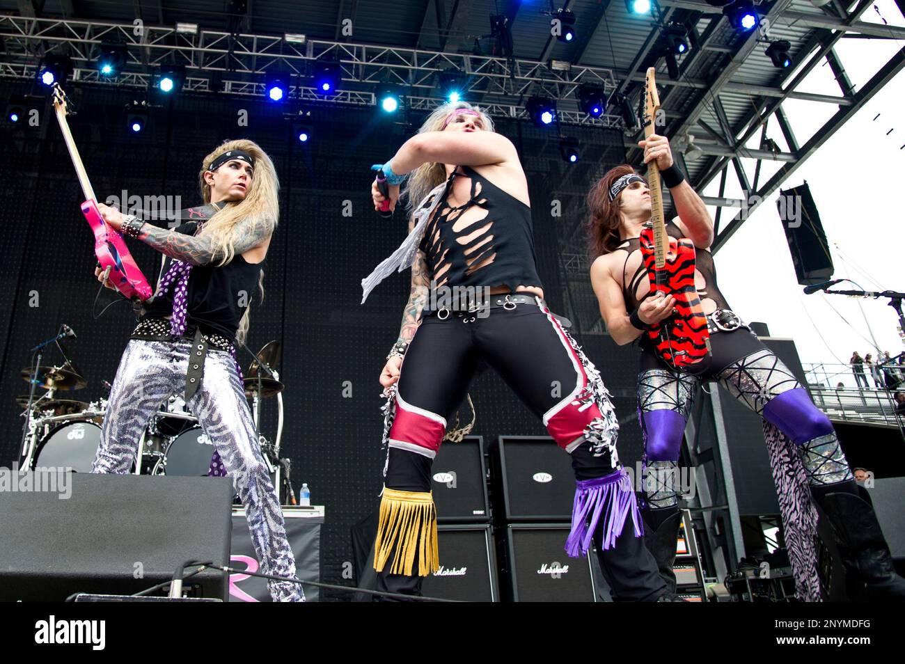 Travis Haley, Ralph Saenz, and Russ Parrish of Steel Panther perform ...