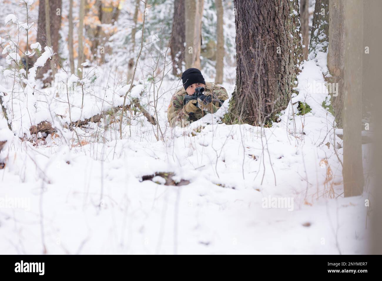 U.S. Army Cpl. Eric Spagnuolo practices squad movement techniques with ...