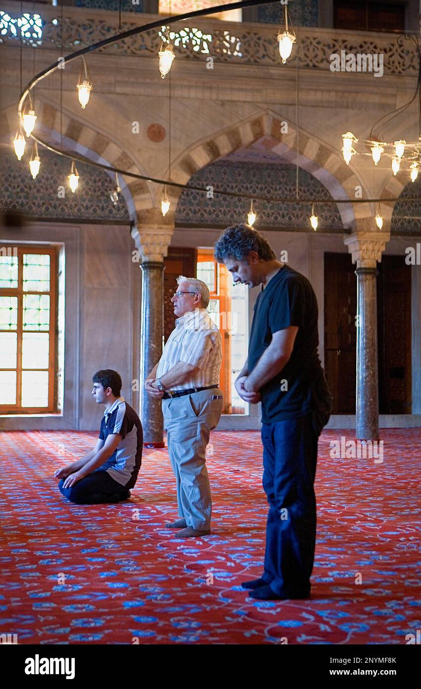 Praying at Mosque Sultan Ahmet, Blue Mosque. Istanbul. Turkey Stock ...