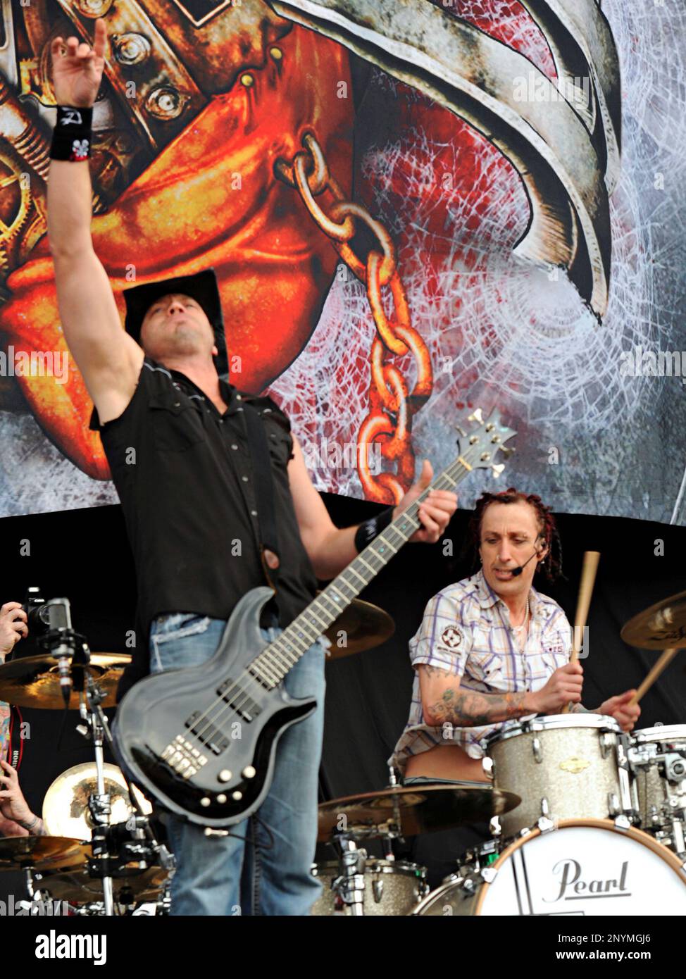 Clint Lowery, left, and Morgan Rose of Sevendust performs at Rock on ...