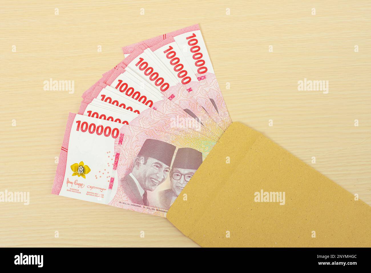 Cash payment concept. Indonesian rupiah currency (Rp. 100.000 Seratus ...