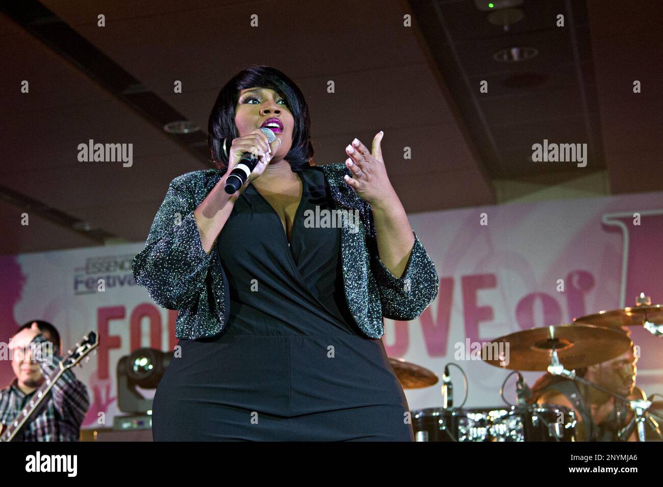 Kelly Price performs at the Essence Festival at the Mercedes-Benz ...