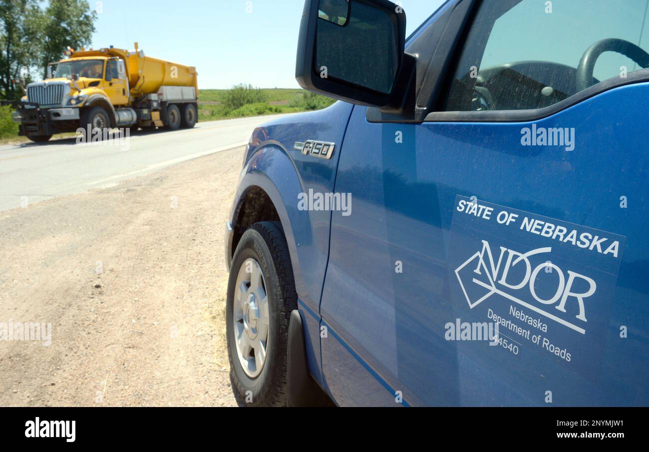 A Nebraska Dept. of Roads vehicle is parked on the side of the road ...
