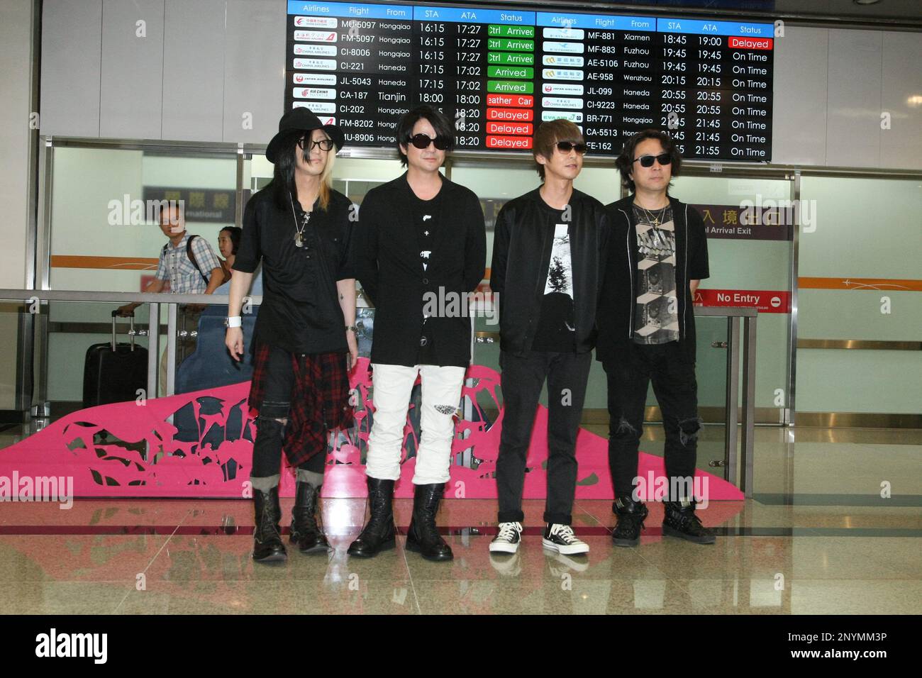 GLAY's lead singer TERU, guitarist HISASHI, bass player JIRO and ...