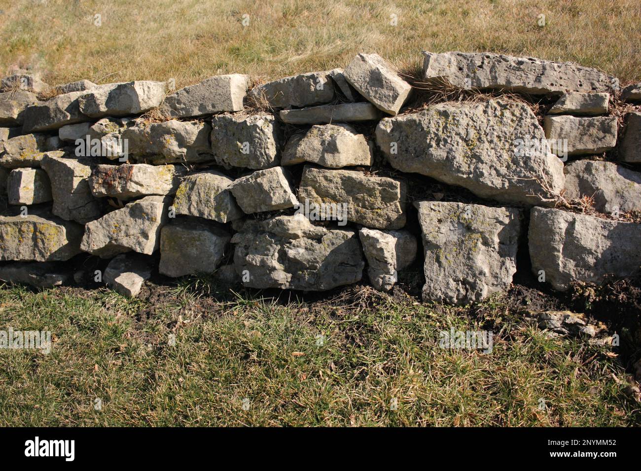 The ruins of an old stone wall on a country hill Stock Photo - Alamy