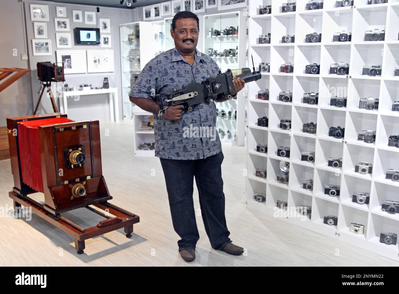 Mr S. Ramanathan, Owner of the vintage camera's museum holding the ...