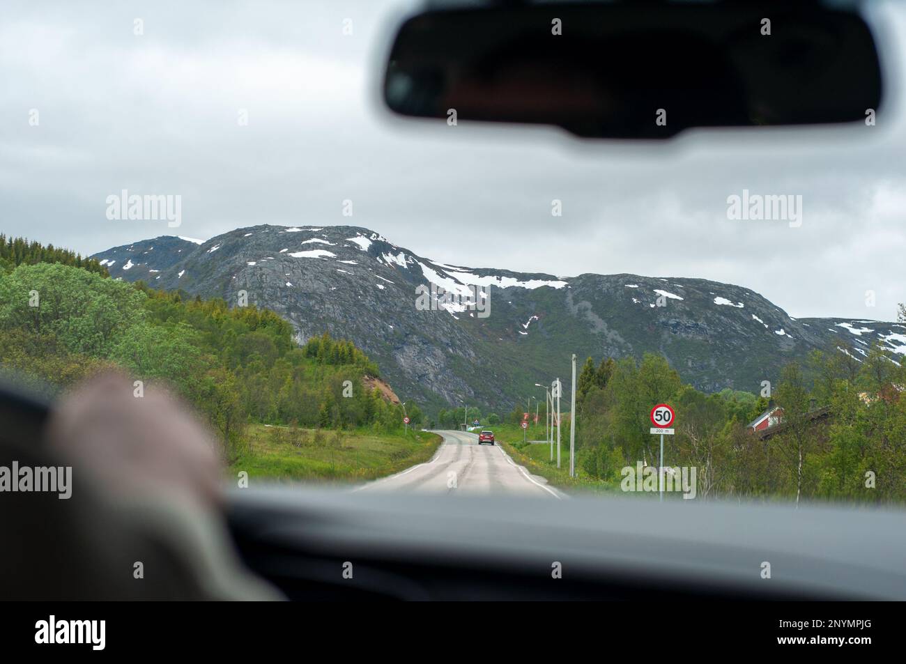 View to mountains from car front window on road in North Norway Stock ...