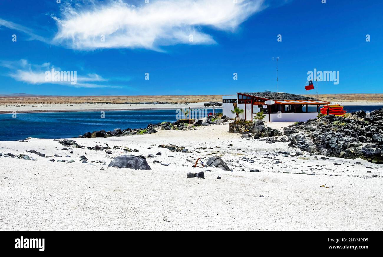 Beautiful ocean lagoon. white wild sand beach, lonely restaurant house ...