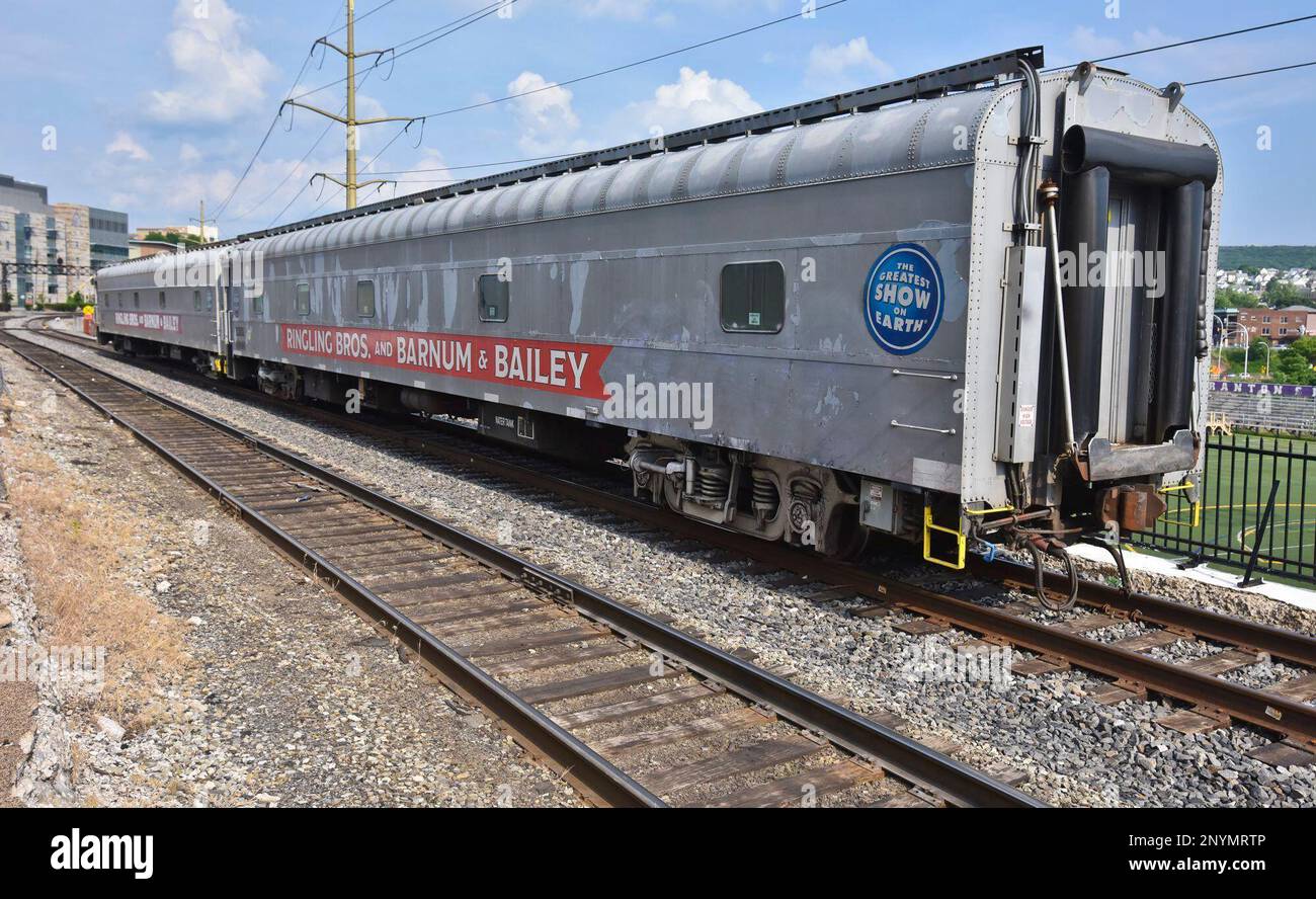 Ringling Bros. and Barnum & Bailey train cars sit on the tracks behind ...