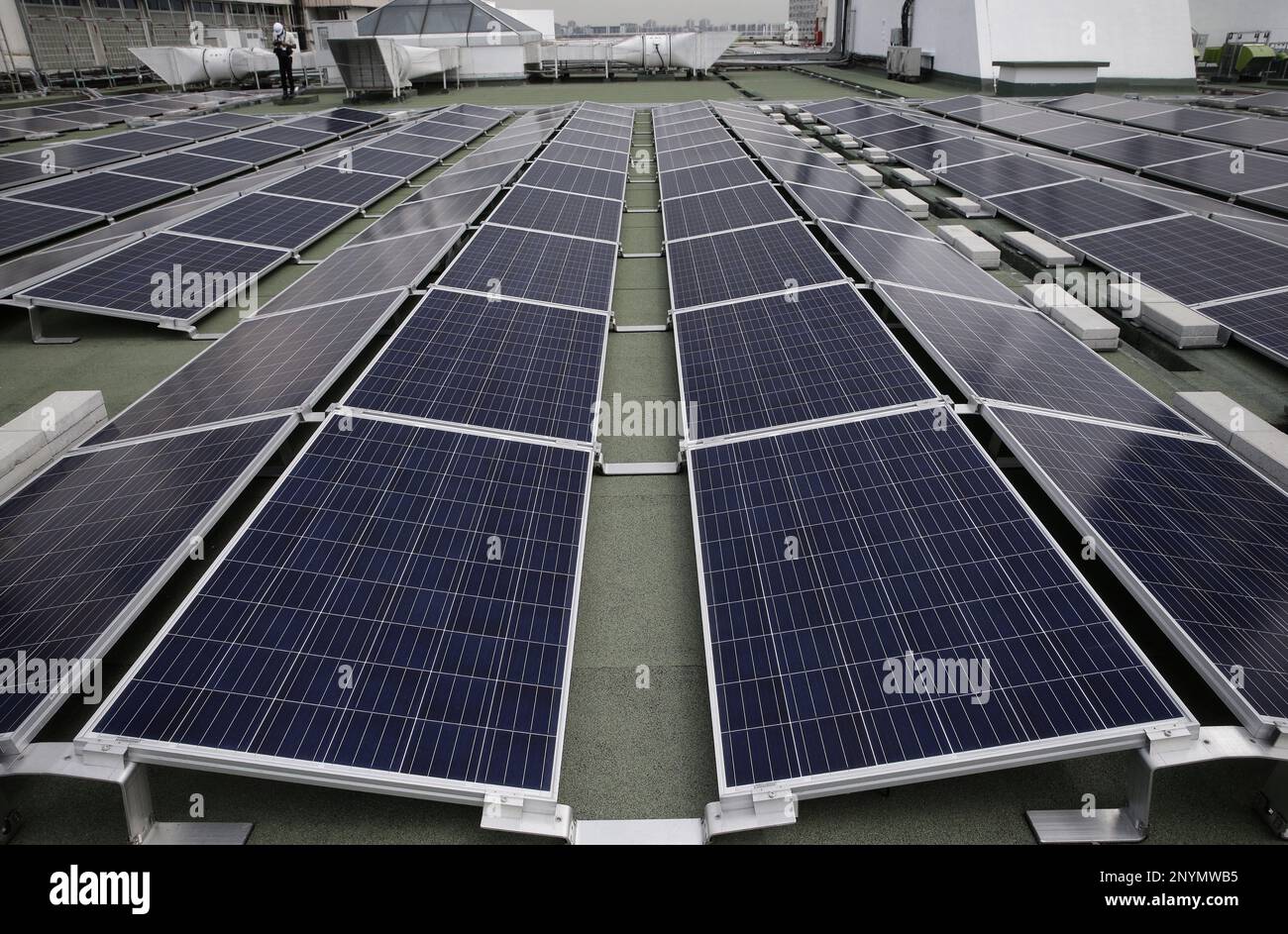 Aerial view of the solar panels on the rooftops of JTC's Jurong Town ...