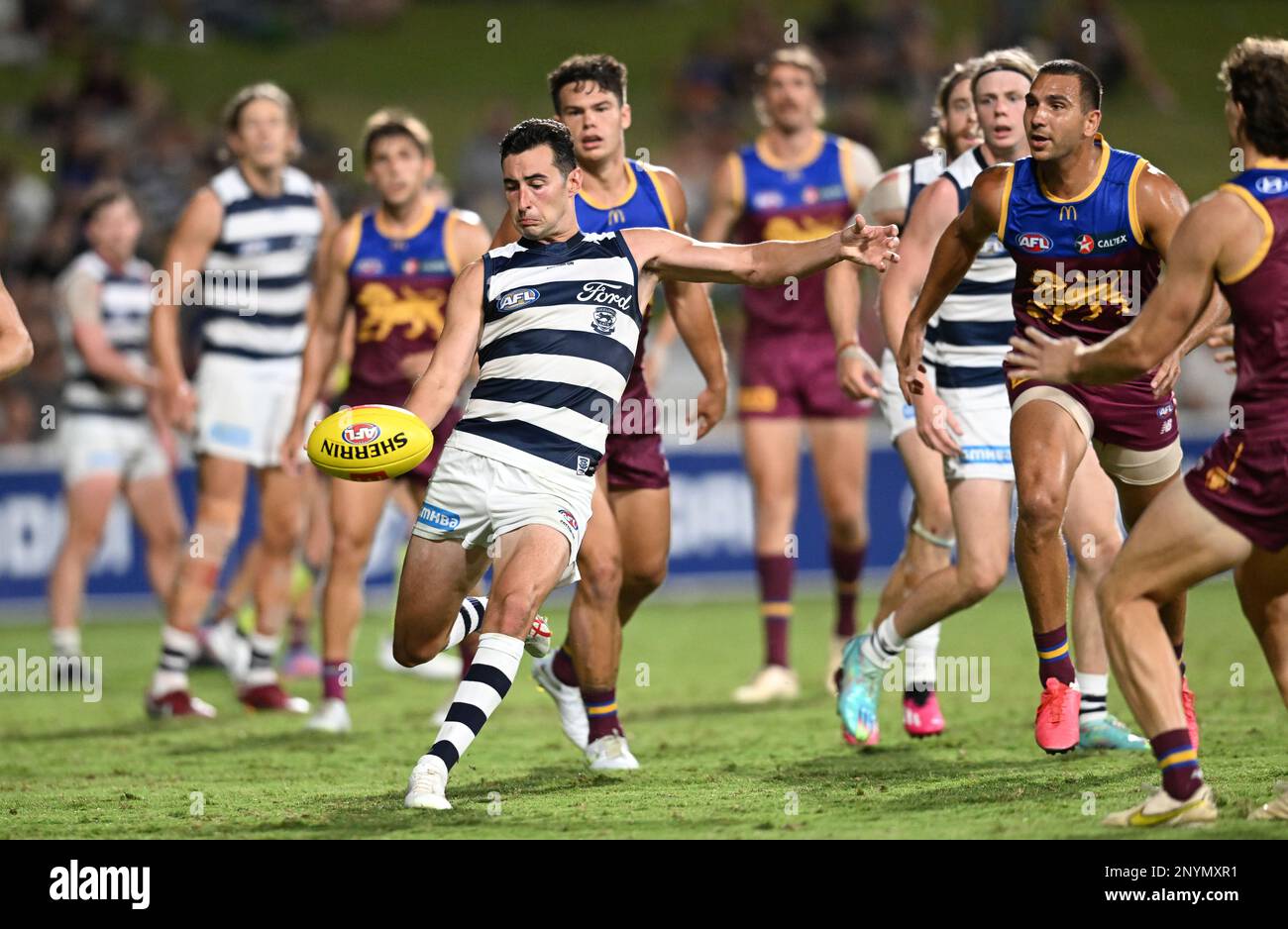 Sam Simpson (centre) of the Cats in action during the AFL official ...