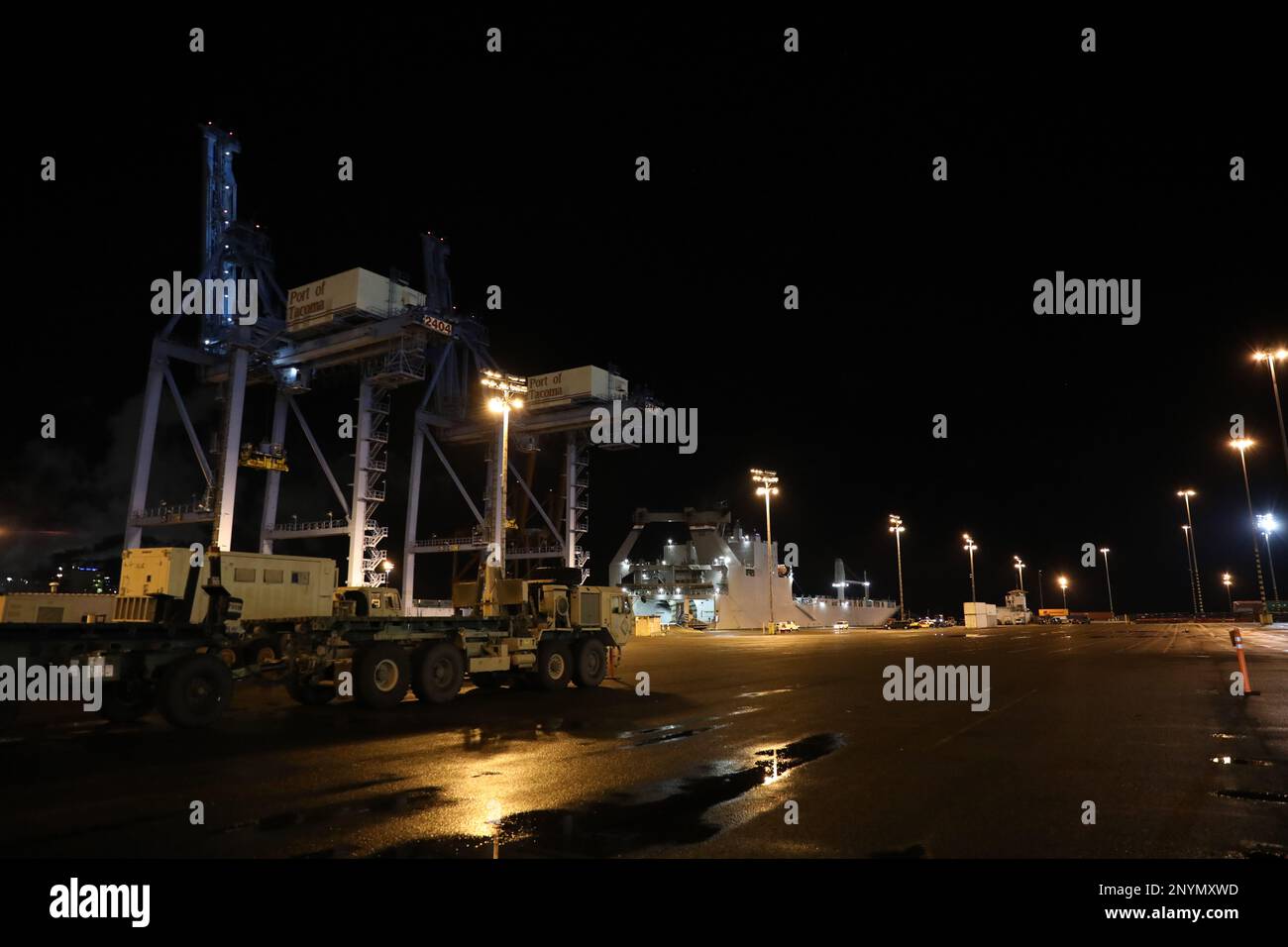 Soldiers of Joint Base Lewis-McChord stage vehicles for transportation ...