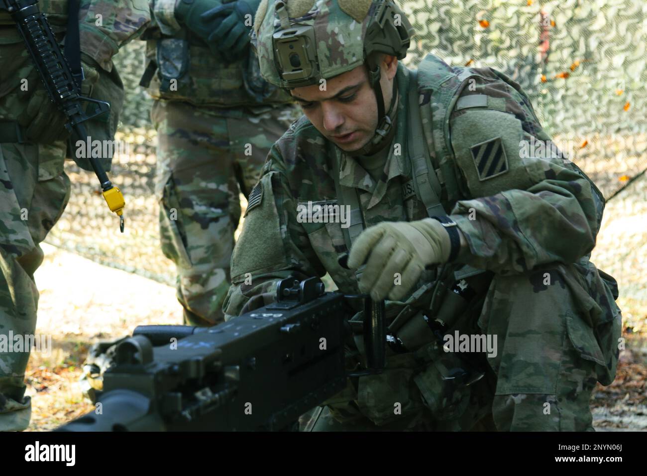 A soldier assigned to the 3rd Infantry Division performs a functions ...