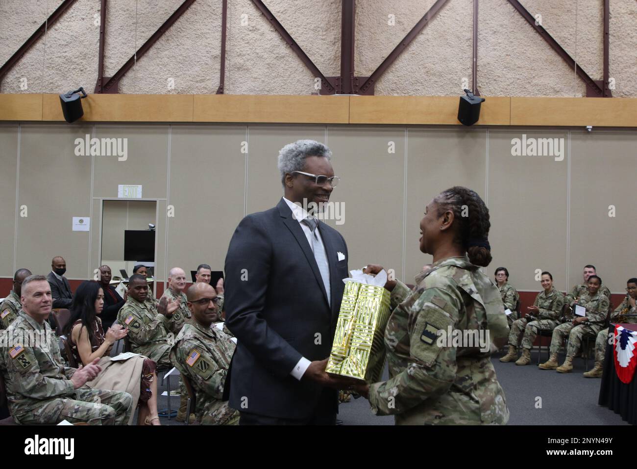 Brig. Gen. Patricia Wallace's husband, Mr. Johnathan Powell, is seen ...