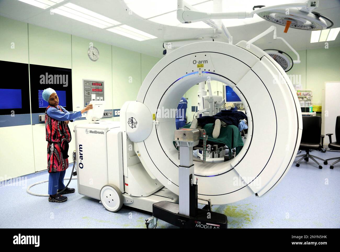 A demonstration of the O arm surgical imaging system, which provides a ...