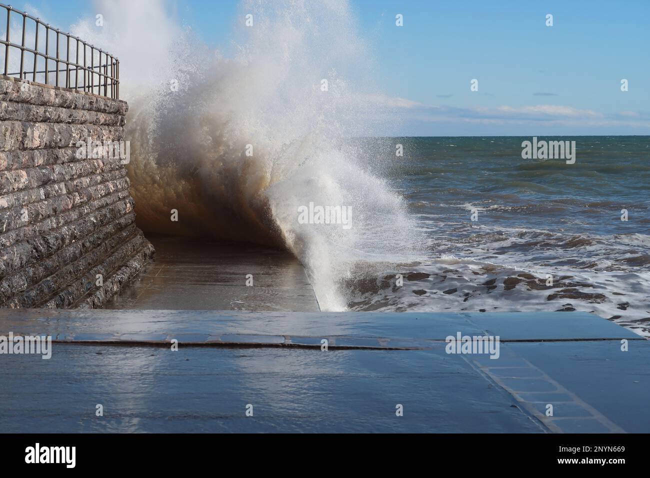 Wave crashing against seawall hi-res stock photography and images - Alamy