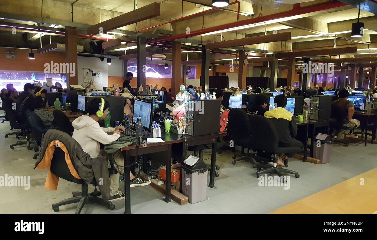 Young Indonesian animators working in the studio belonging to Infinite ...