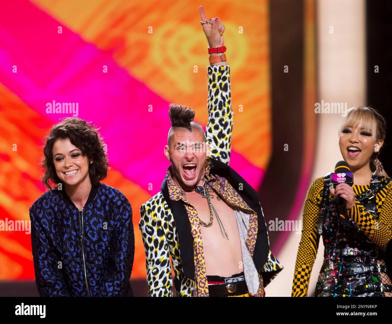 Cole Whittle of DNCE, center, reacts next to JinJoo Lee of DNCE, right ...