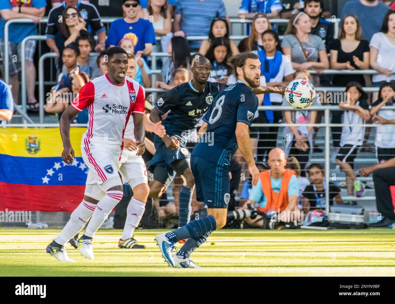 SAN JOSE, CA - JUNE 17: A pass gets by Sporting Kansas City midfielder ...