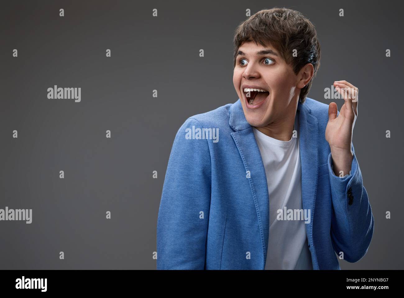 shocked man with surprise expression and excited face Stock Photo - Alamy