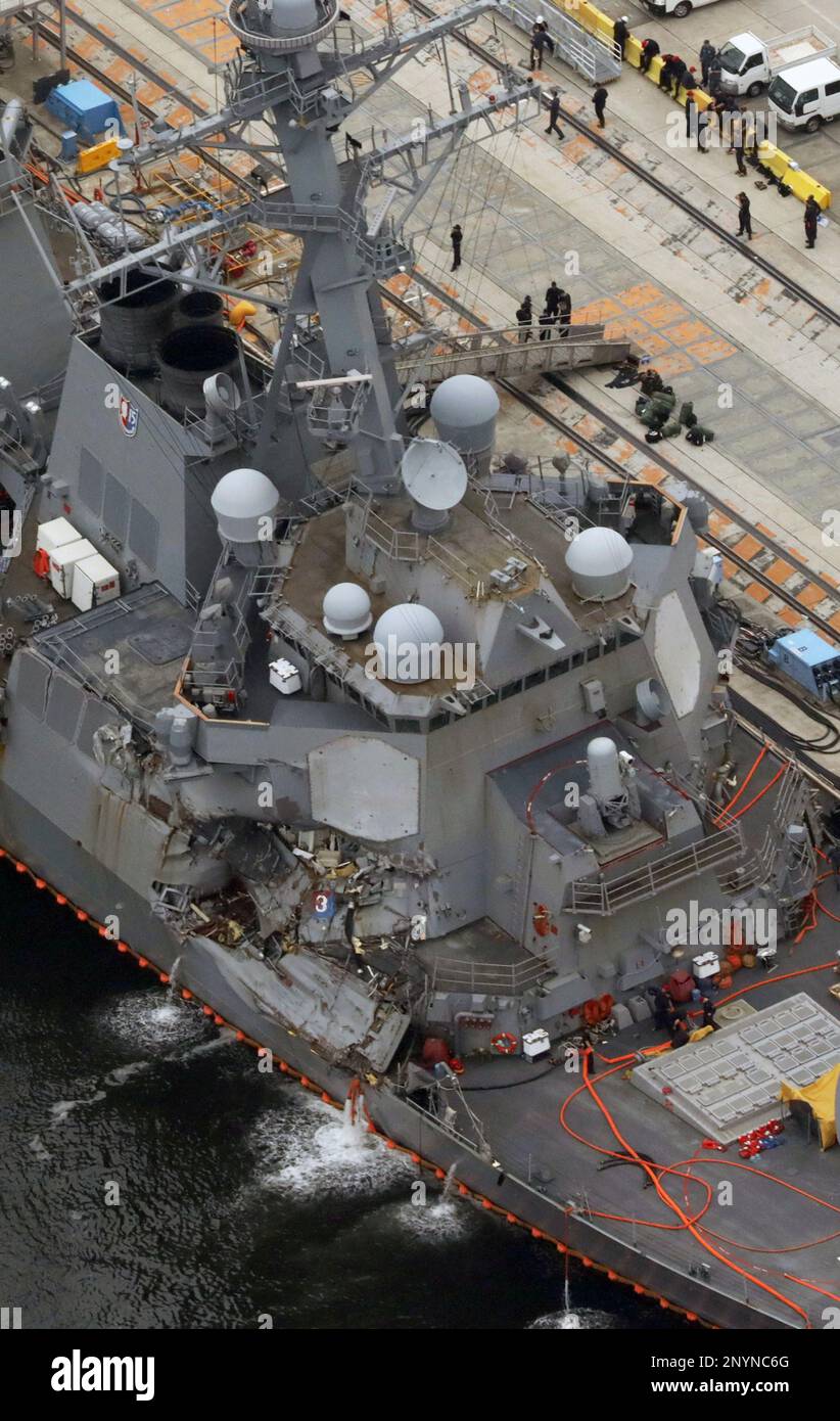 This aerial photo shows the USS Fitzgerald (8,315t), damaged by the ...