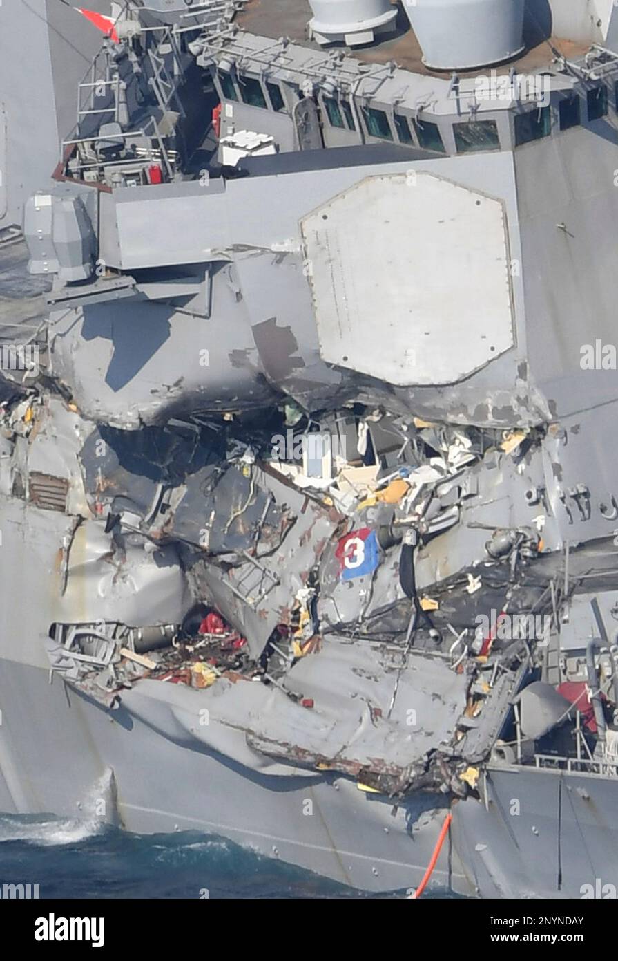 An aerial photo shows the USS Fitzgerald that is damaged by the ...