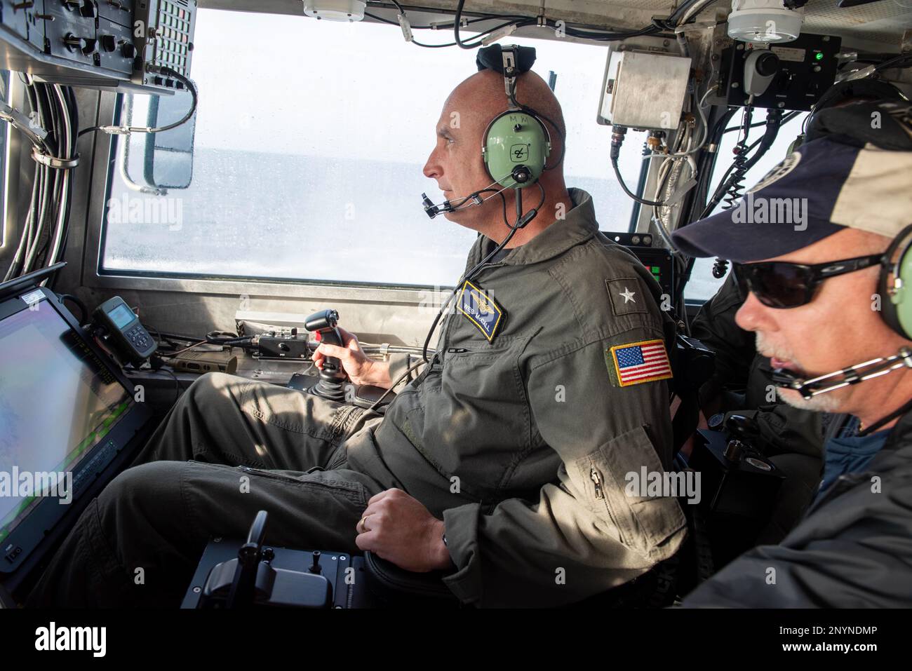 Rear Adm. Wesley McCall, Navy Region Southeast commander, pilots a ...