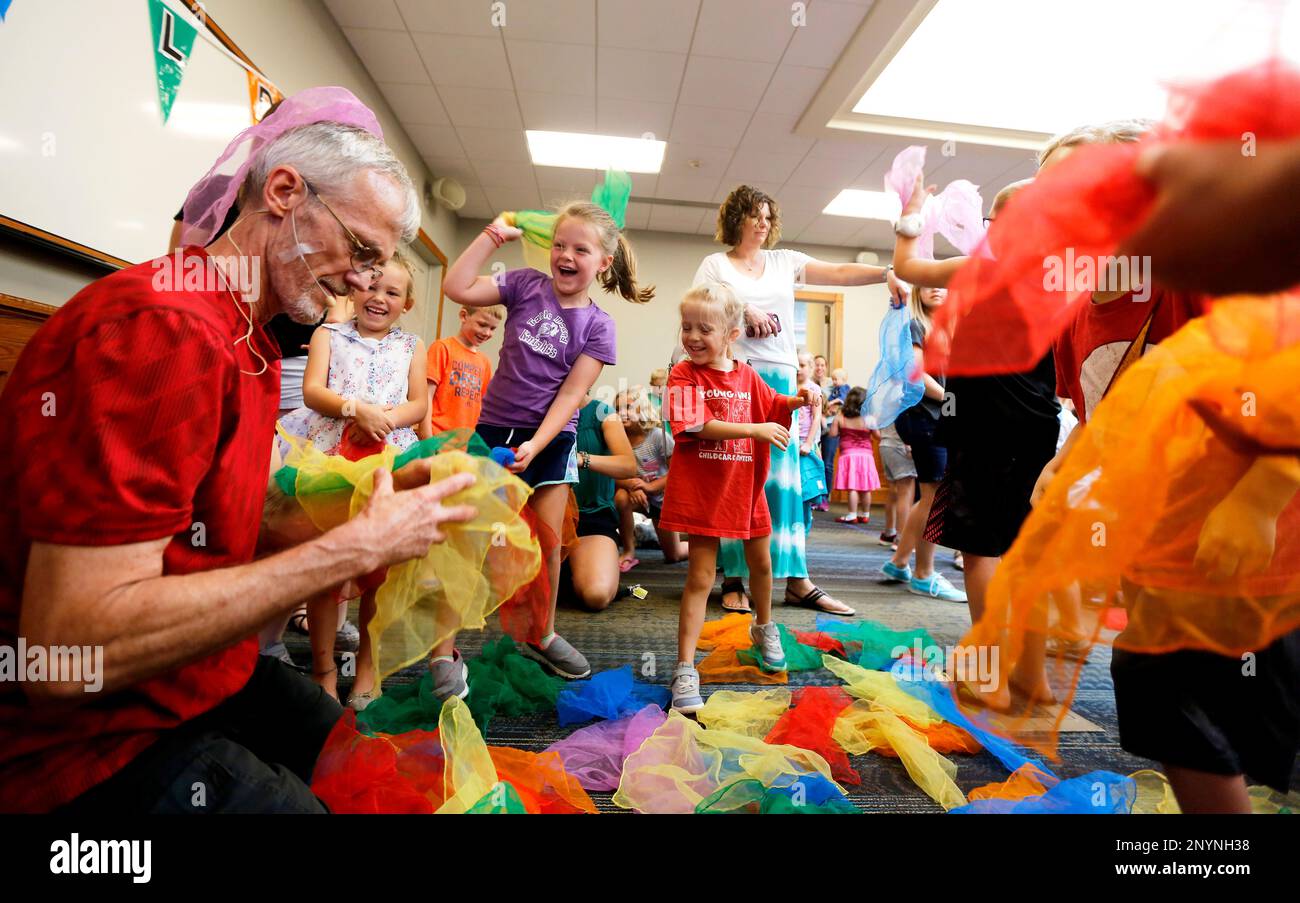 Mark Hanson of Hanson Shows has fun with attendees after a performance ...