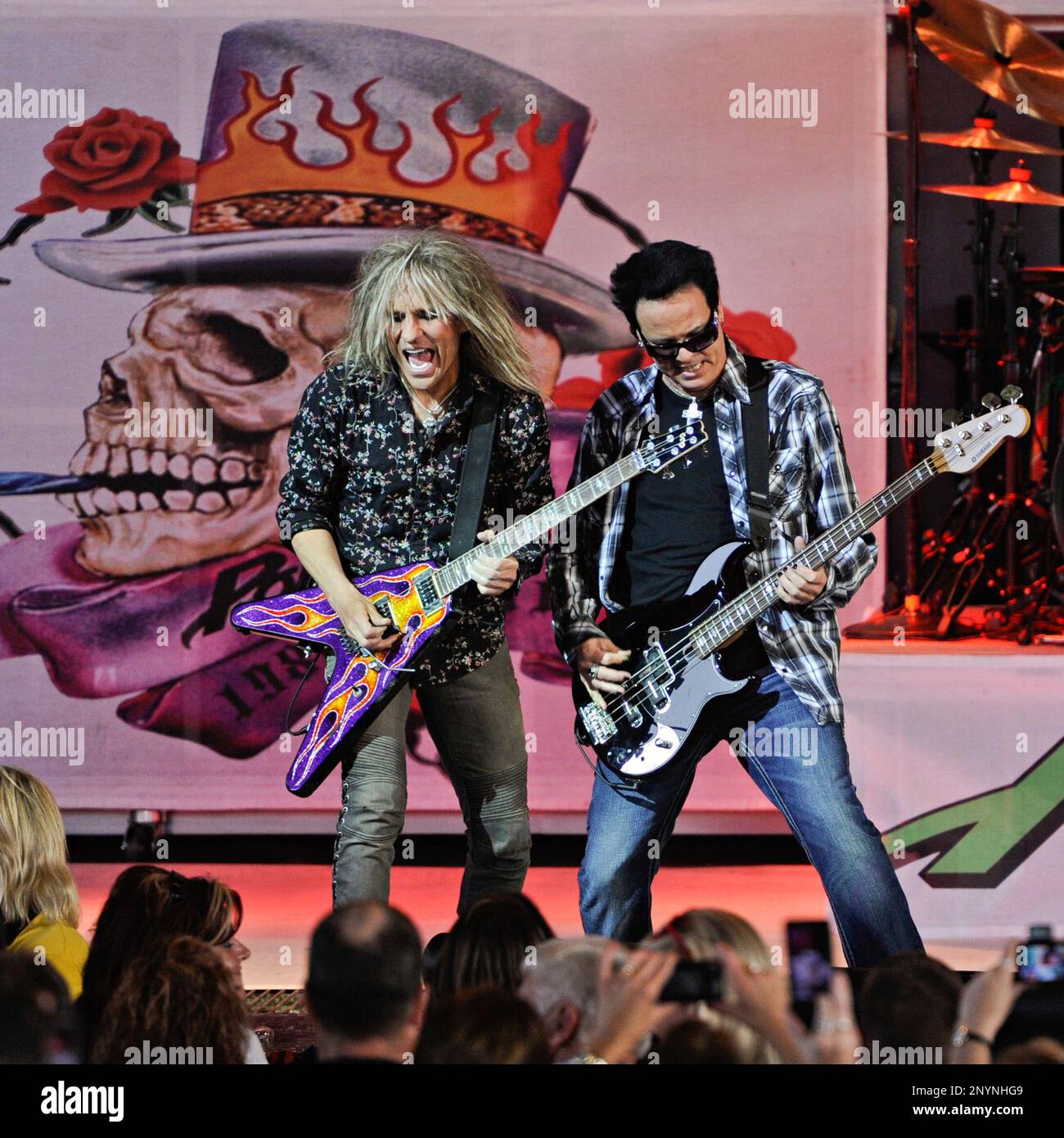 C.C. DeVille, left, and Bobby Dall of Poison perform at Riverbend Music ...