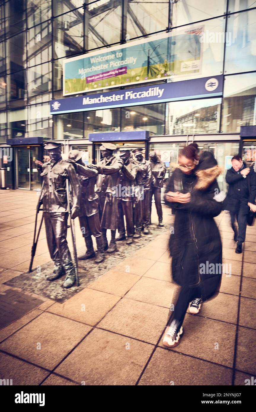 Train commuters rushing past the statue 'Victory over blindness ...