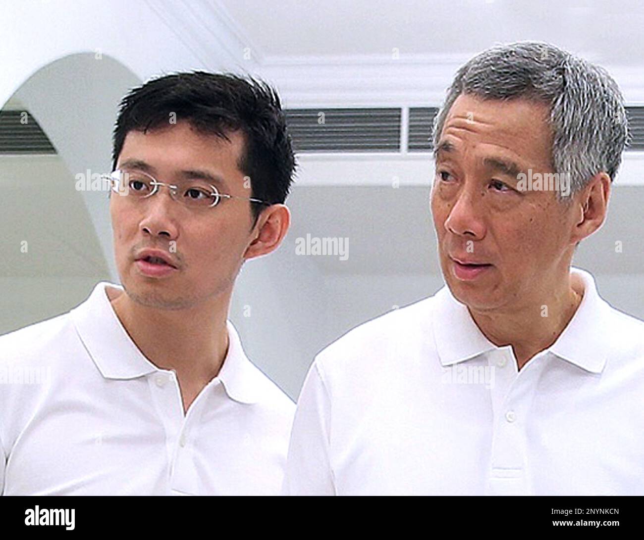 Prime Minister Lee Hsien Loong with his son Li Hongyi. Hongyi is now ...