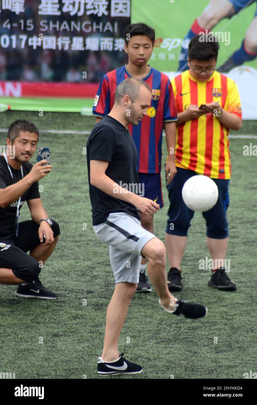Spanish football player Andres Iniesta kicks the ball during a ...
