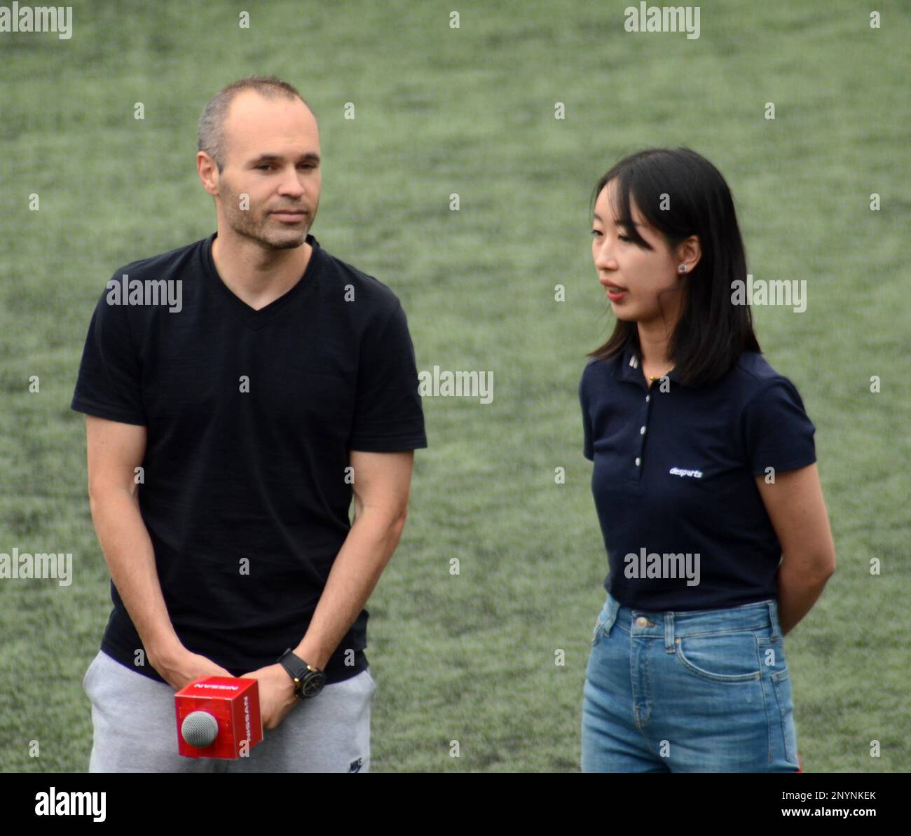 Spanish football player Andres Iniesta, left, is pictutred during a ...