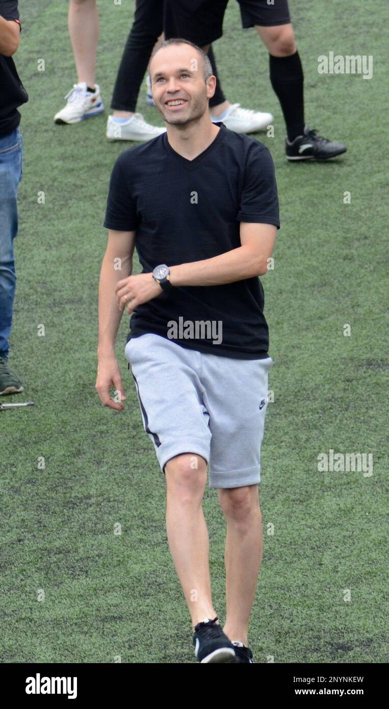 Spanish football player Andres Iniesta kicks the ball during a ...
