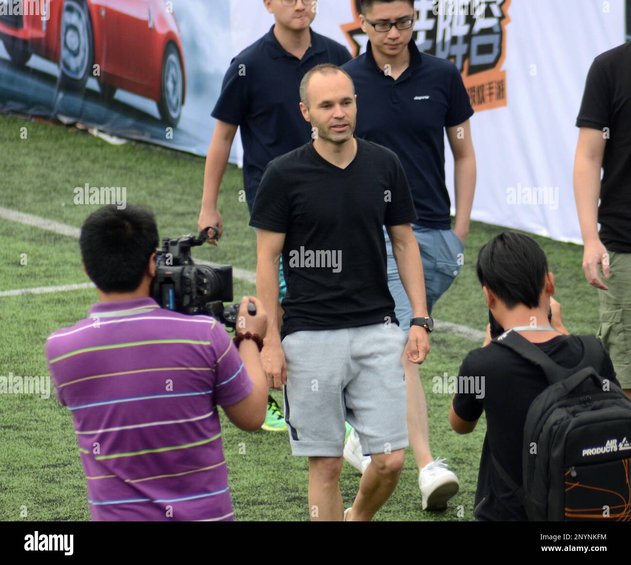 Spanish football player Andres Iniesta, center, is pictured during a ...