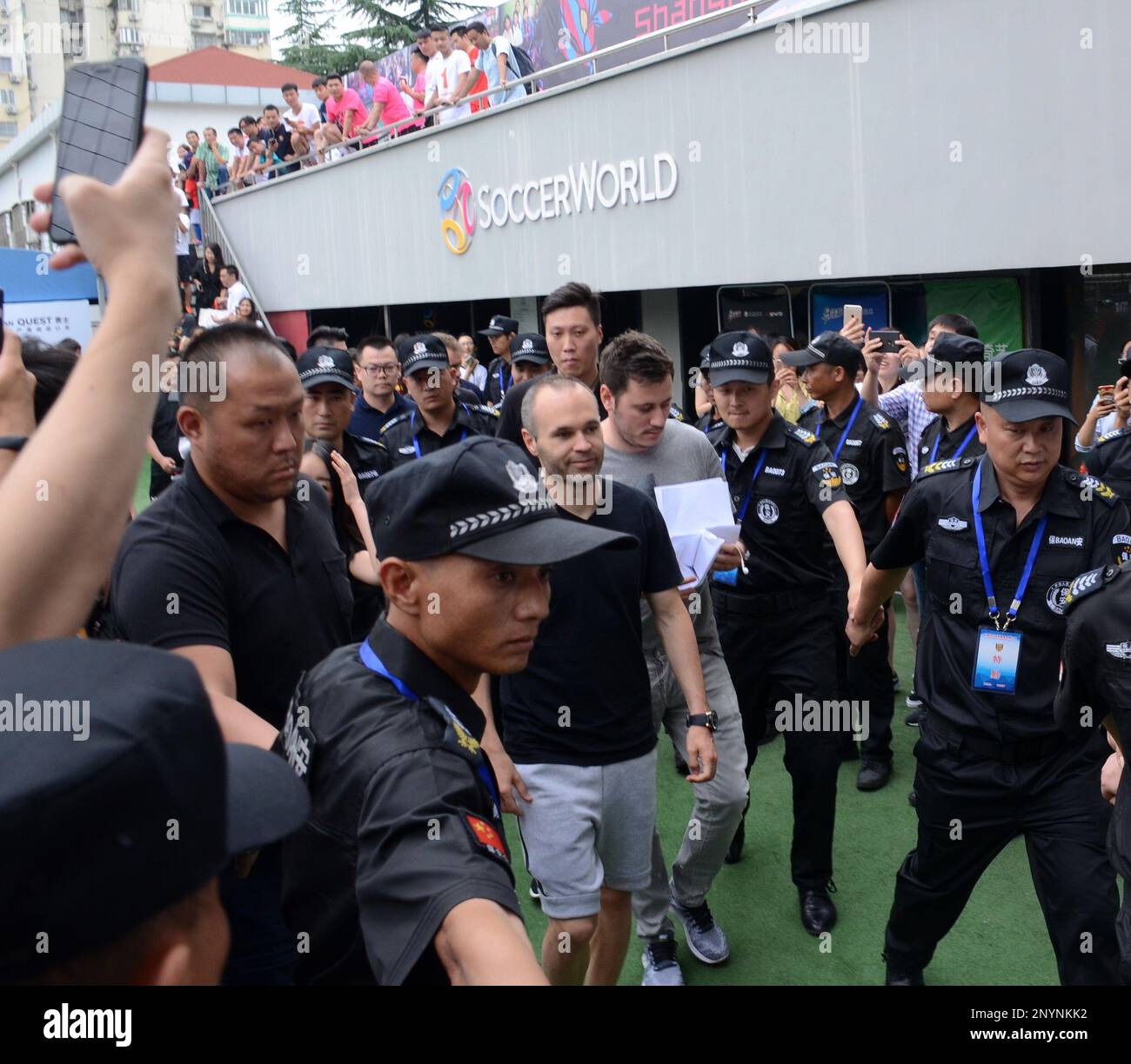 Spanish football player Andres Iniesta, center, is pictured during a ...