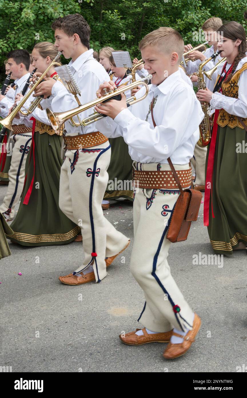 Marching band musicians wearing folk clothes, Corpus Christi ...