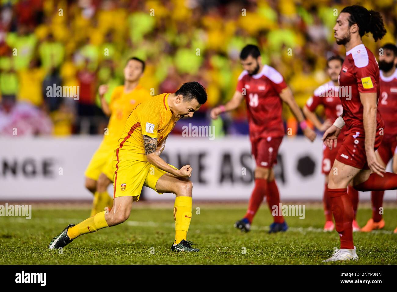 Gao Lin of China celebrates after scoring a goal by a penalty shot ...