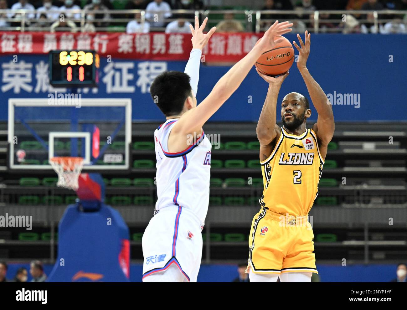 Tianjin. 2nd Mar, 2023. Terry Cummings (R) of Zhejiang Lions shoots during the 29th round match ...