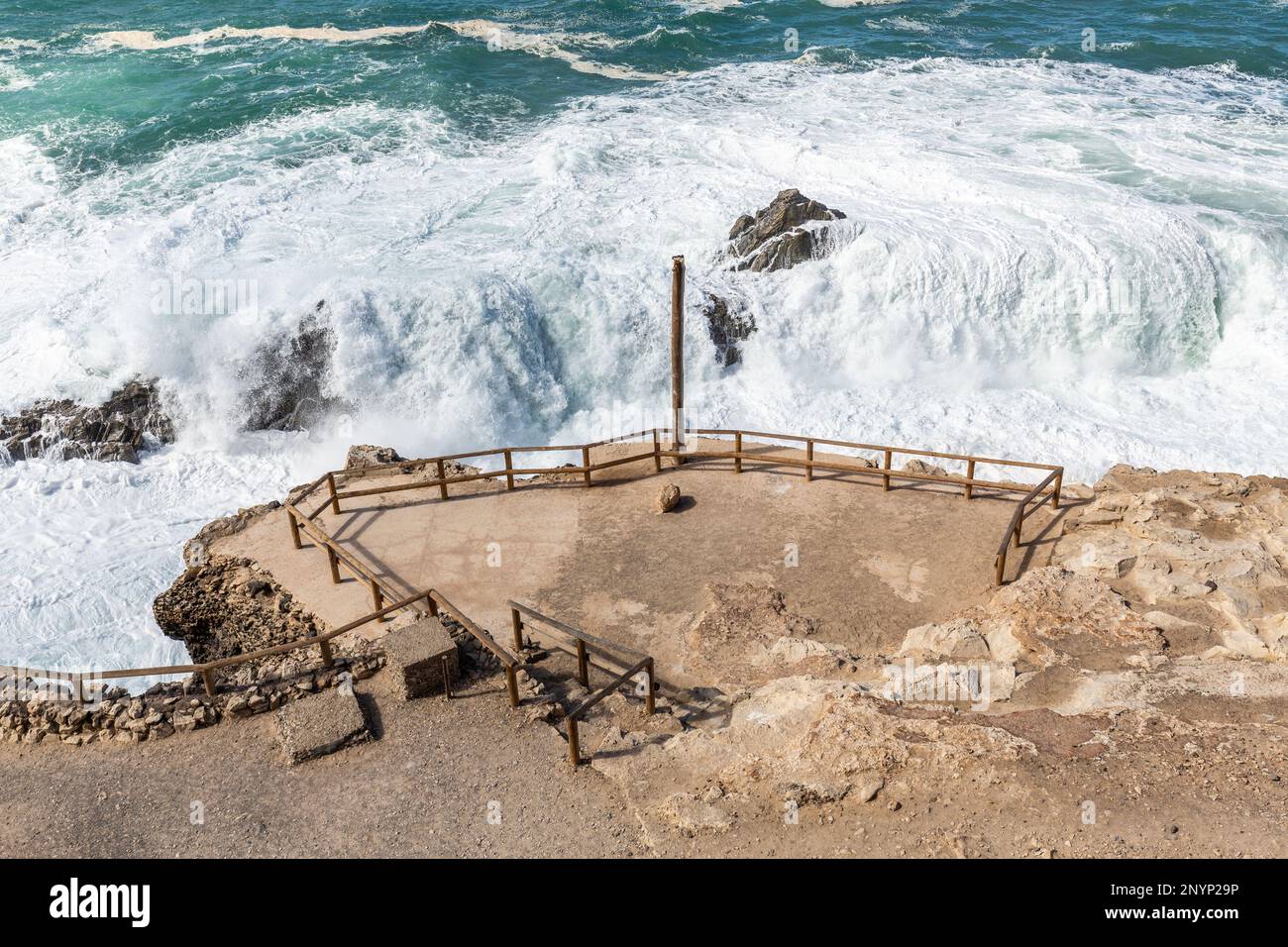 Sea foam covering the reefs on which a big wave has just crashed. Ajuy ...